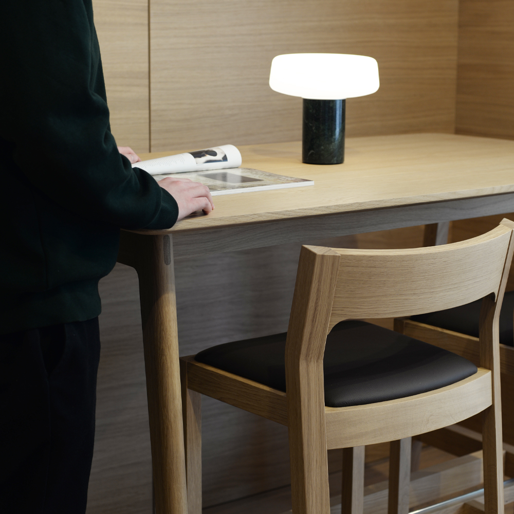 Fusing wood and leather, the Case Furniture Profile Dining Stool is ...